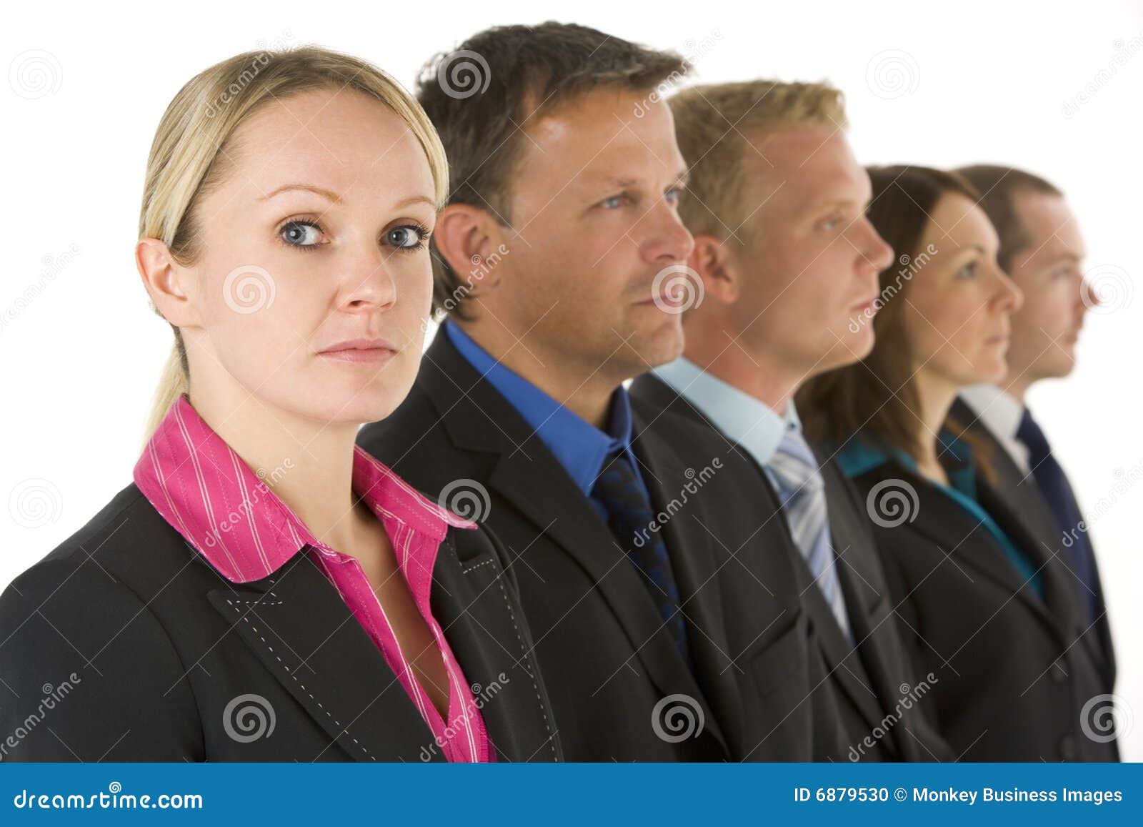 Group of Business People in a Line Looking Serious Stock Photo - Image ...