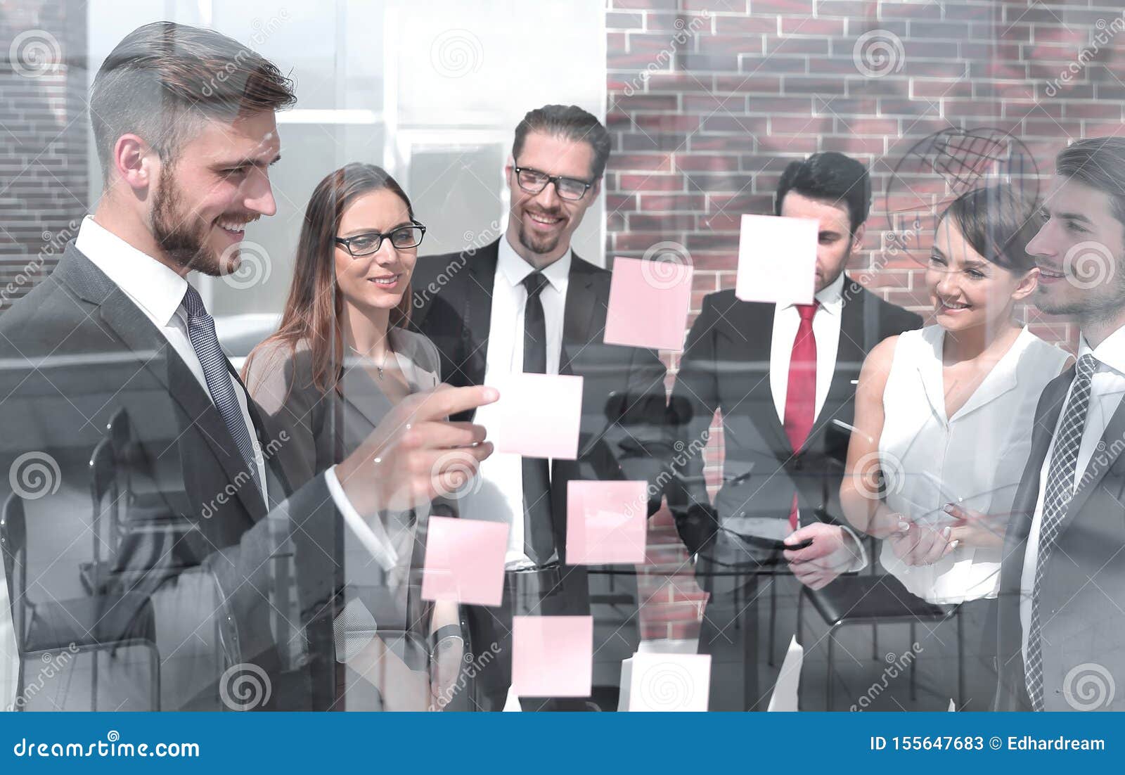 Group of Business People Looking at Notes on Glass Stock Image - Image ...