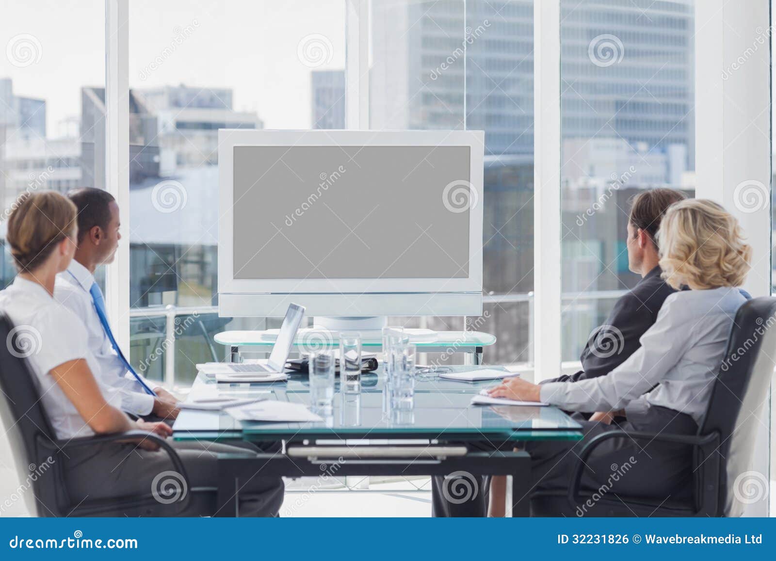 Group of Business People Looking at a Screen Stock Photo - Image of ...