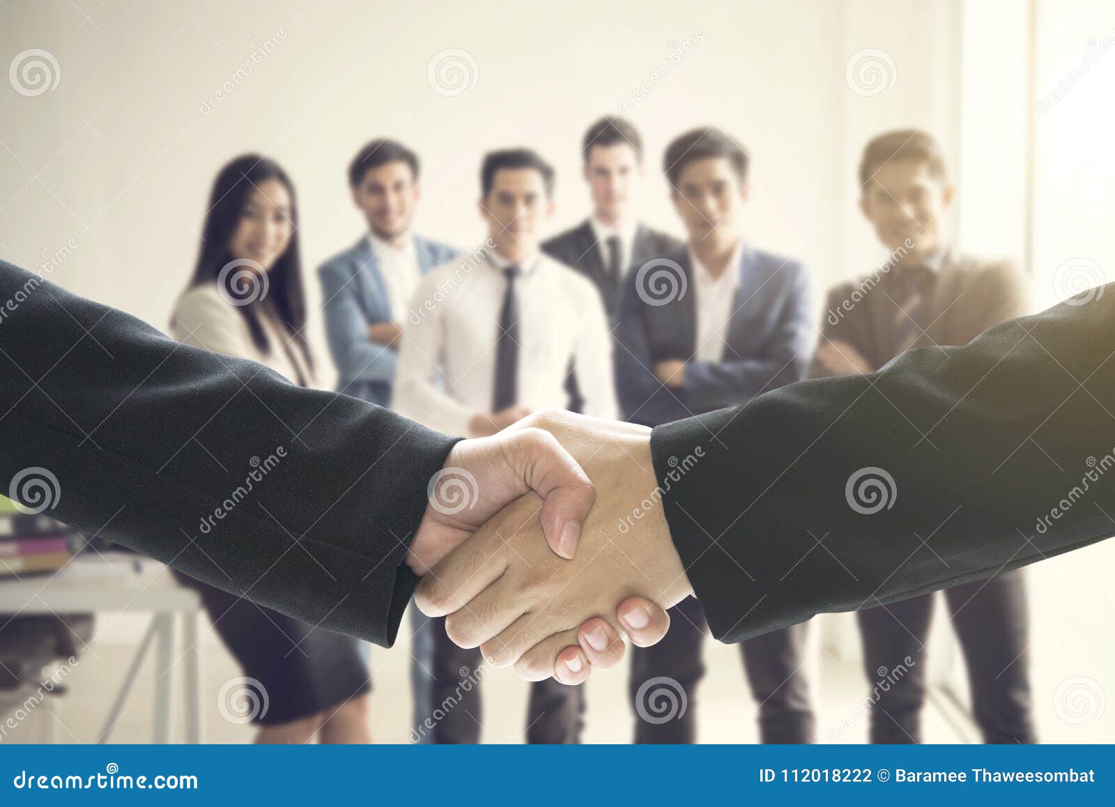Group of Business People Making Handshake Agreement. Stock Photo ...