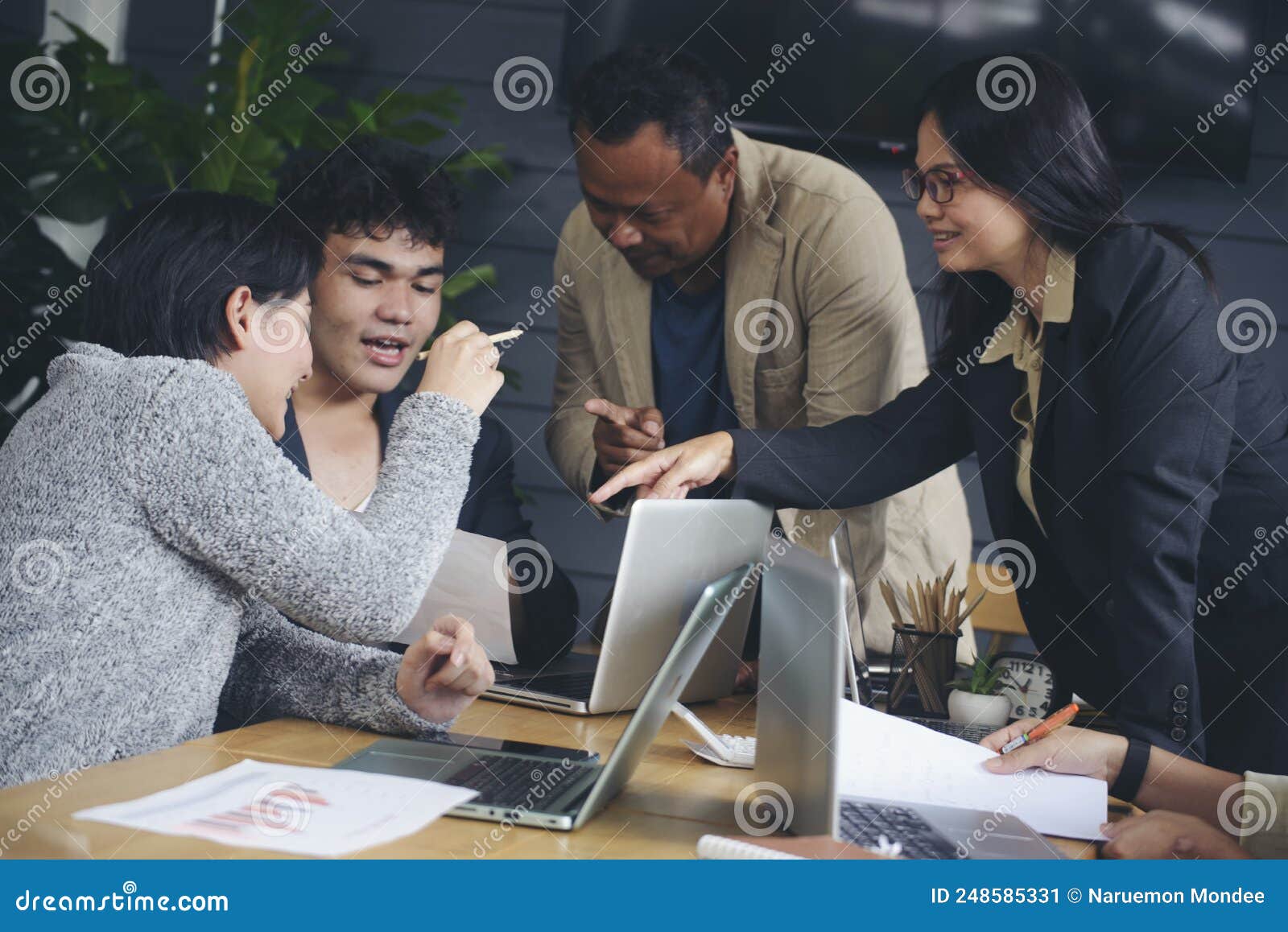 Group of Business People Plan Annual Budget Report and Work To Solution ...