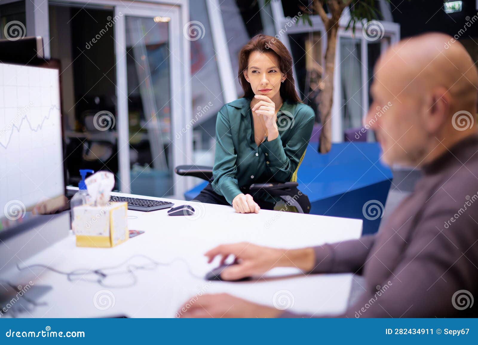 Group of Business People Sitting and Standing at Office Desk Surrounded ...