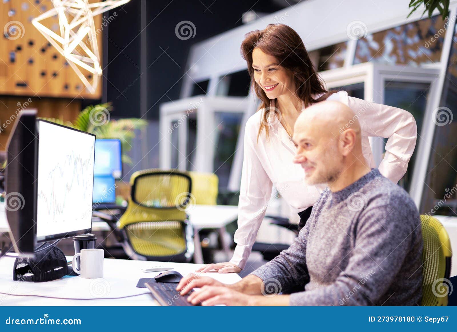 Group of Business People Sitting and Standing Together at the Office ...