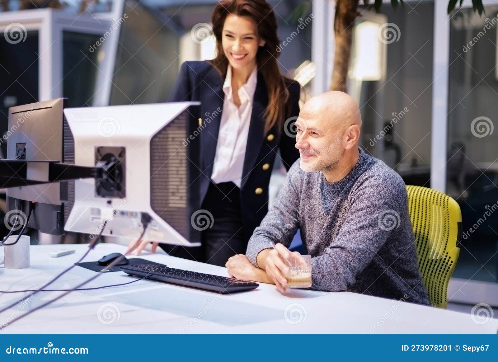 Group of Business People Sitting and Standing Together at the Office ...