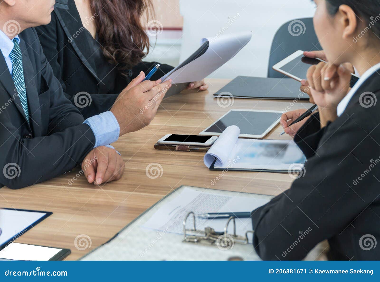 Group of Business People Sitting Talking on the Table Stock Image ...