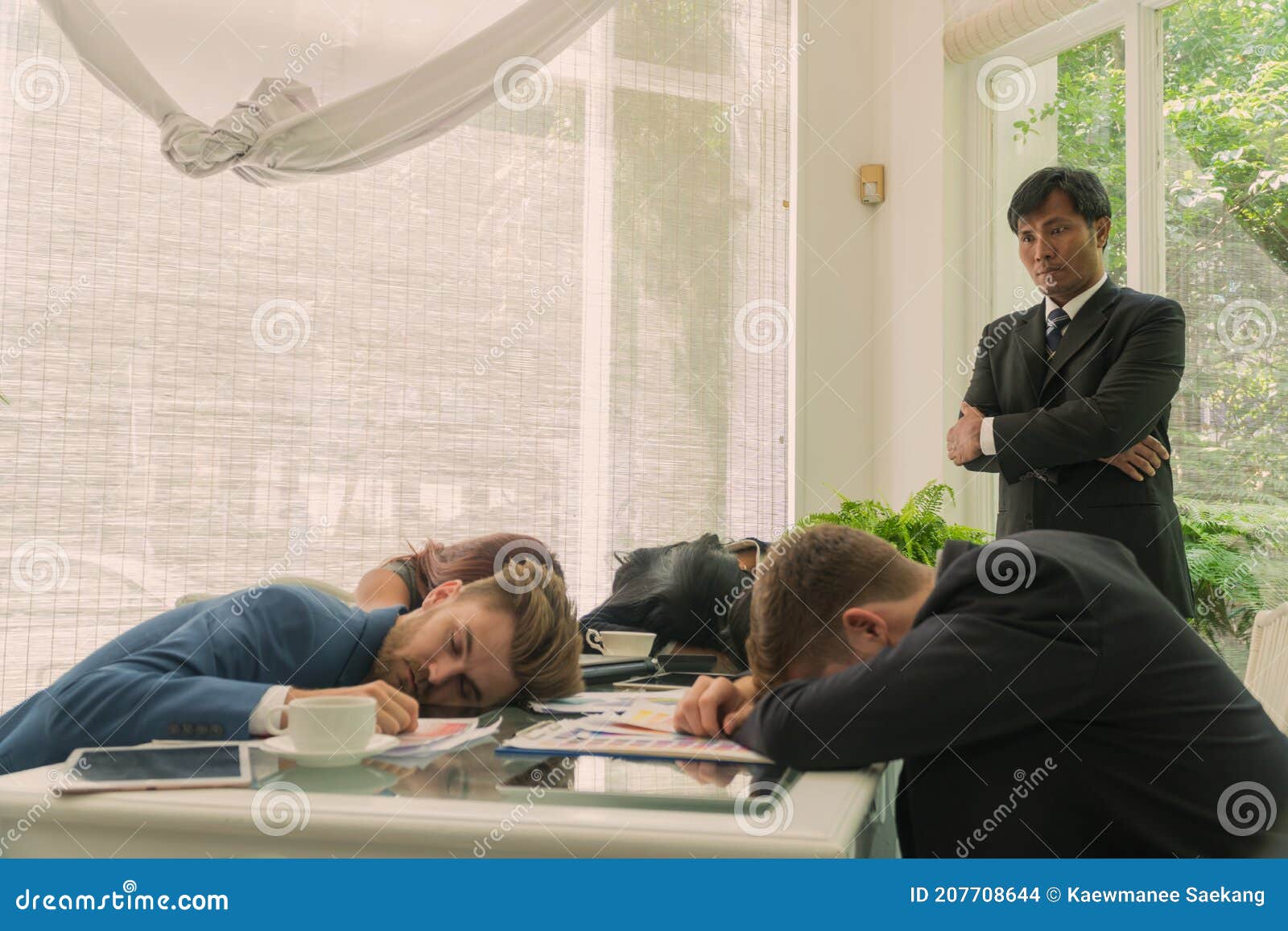 Group of Business People Sleeping on Table, with the Head Stand with a ...