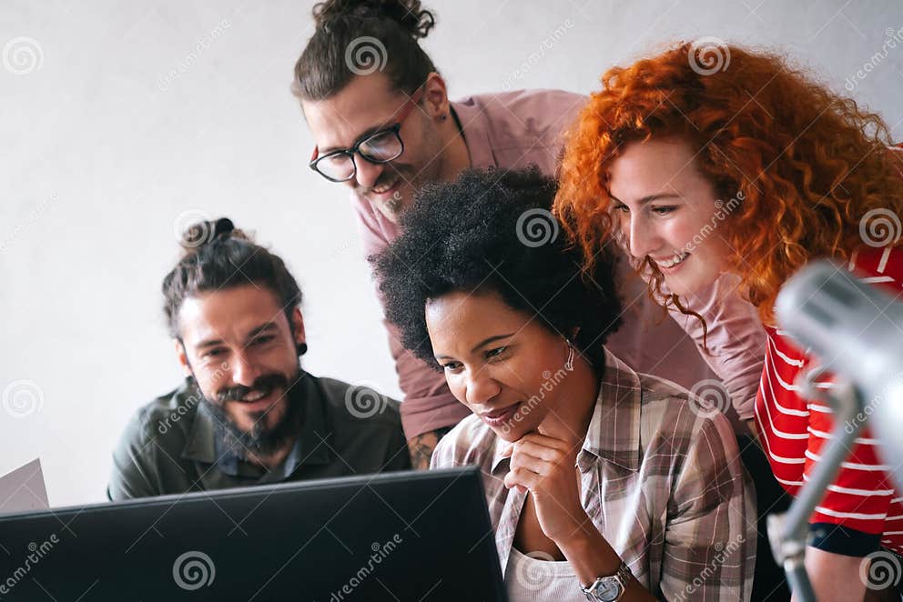 Group of Business People and Software Developers Working As a Team in ...