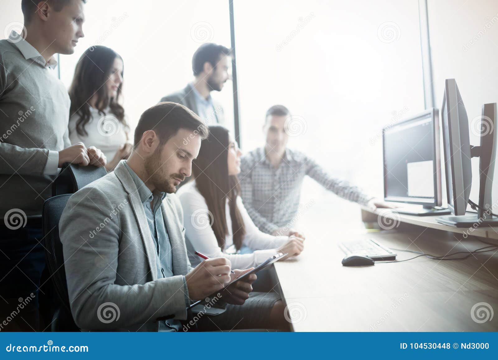 Group of Business People and Software Developers Working Stock Photo ... Group of Business People and Software Developers Working Stock Photo ...