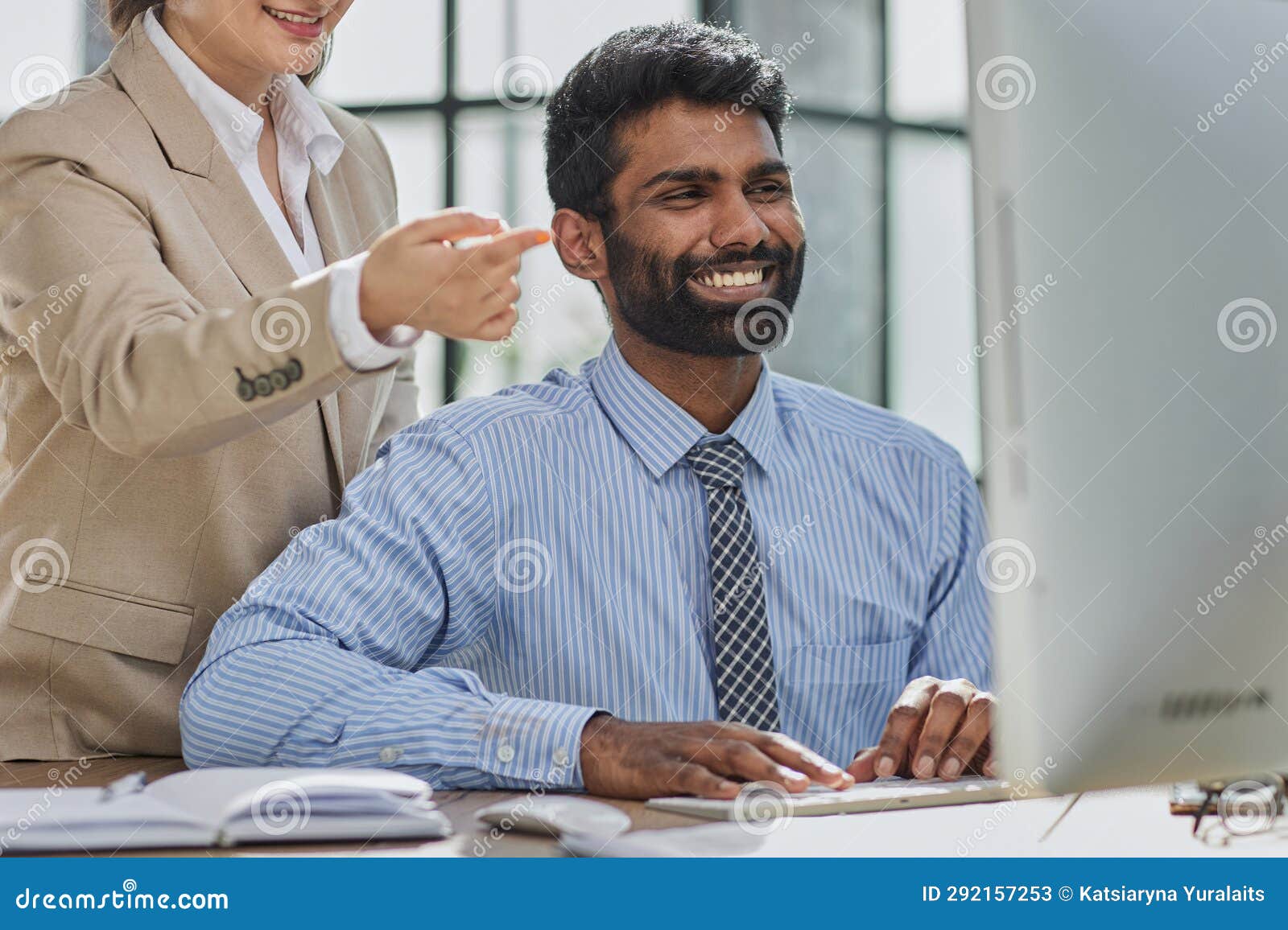 Working Together on Project. Two Young Business Colleagues Working on ...