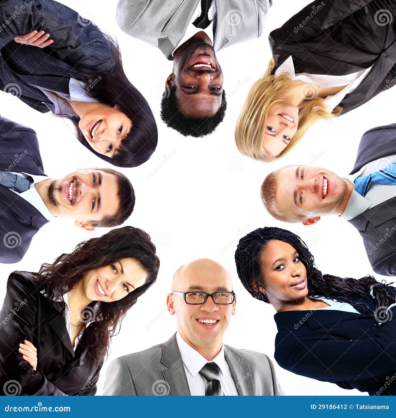 Group of Business People Standing in Huddle Stock Photo - Image of ...
