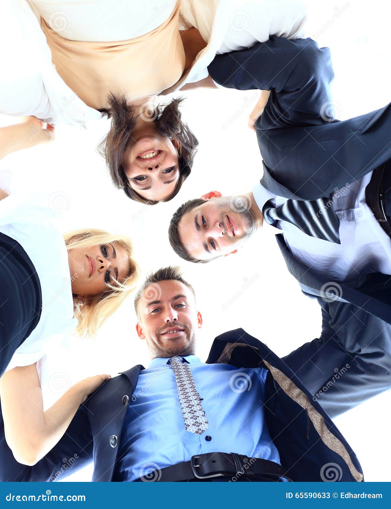 Group of Business People Standing in Huddle Stock Image - Image of ...