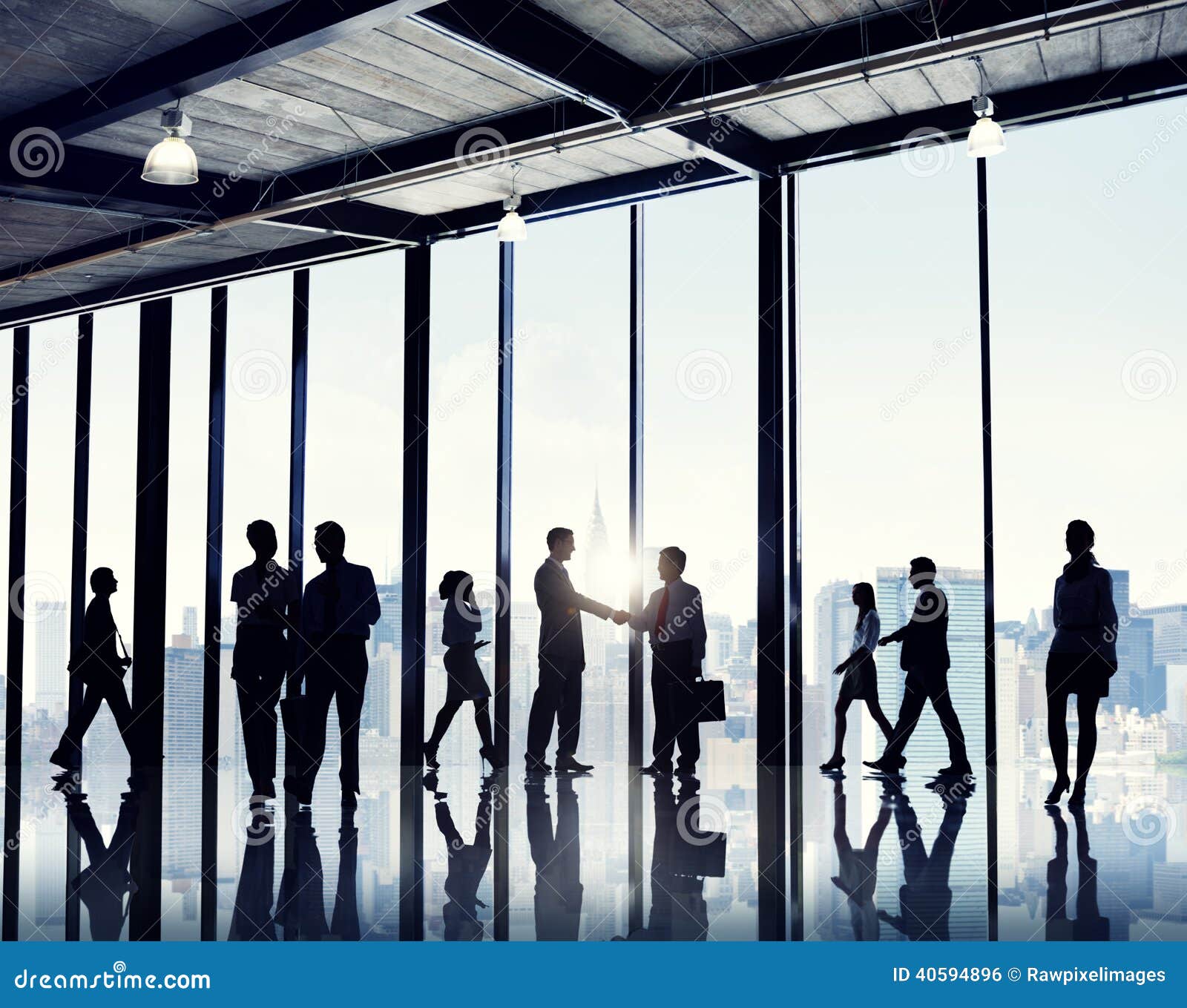 Group of Business People Standing in a Office Building Stock Photo ...