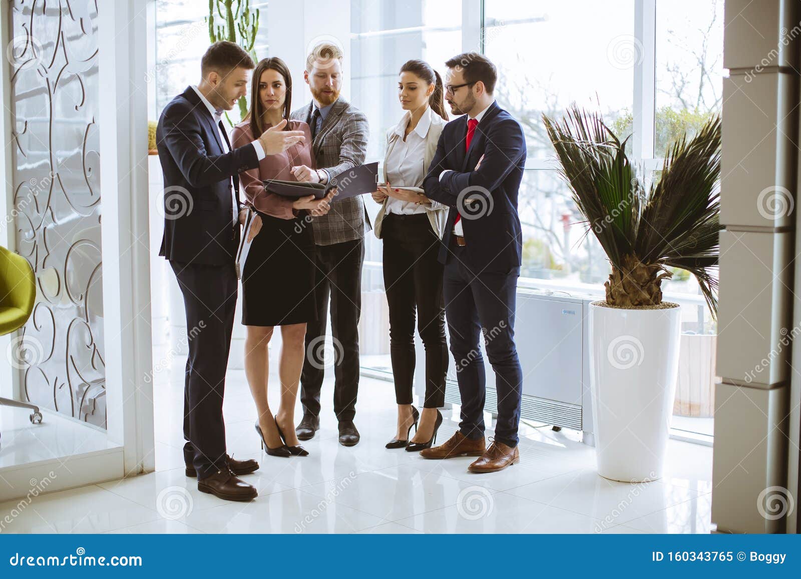 Group of Business People Standing in the Office Stock Image - Image of ...