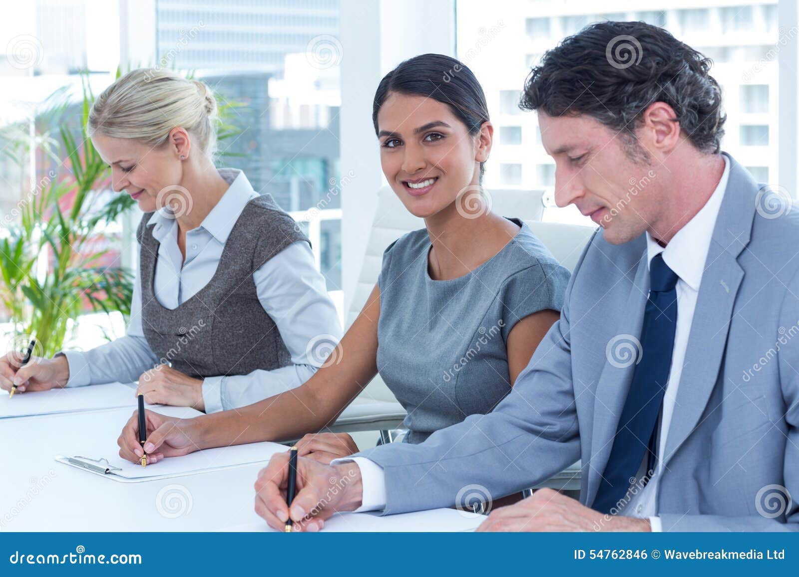 Group of Business People Taking Notes Stock Photo - Image of desk ...