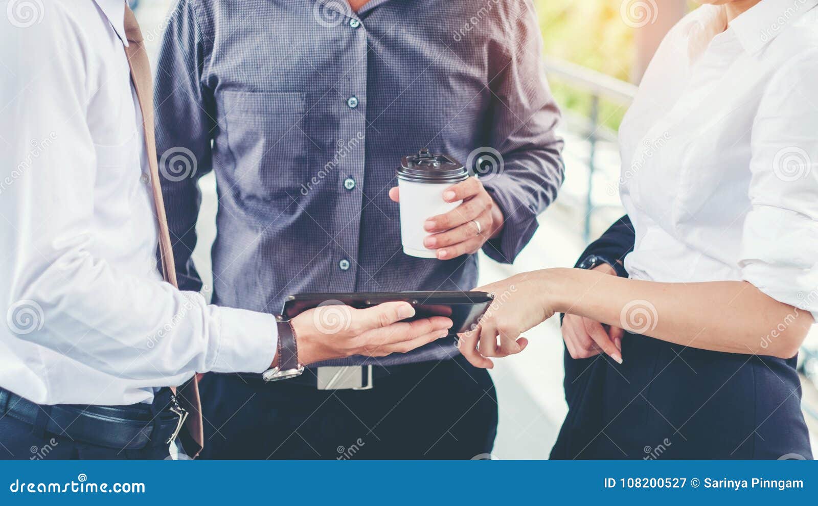Group of Business People Talking Working on Digital Tablet in Outdoor ... Group of Business People Talking Working on Digital Tablet in Outdoor ...