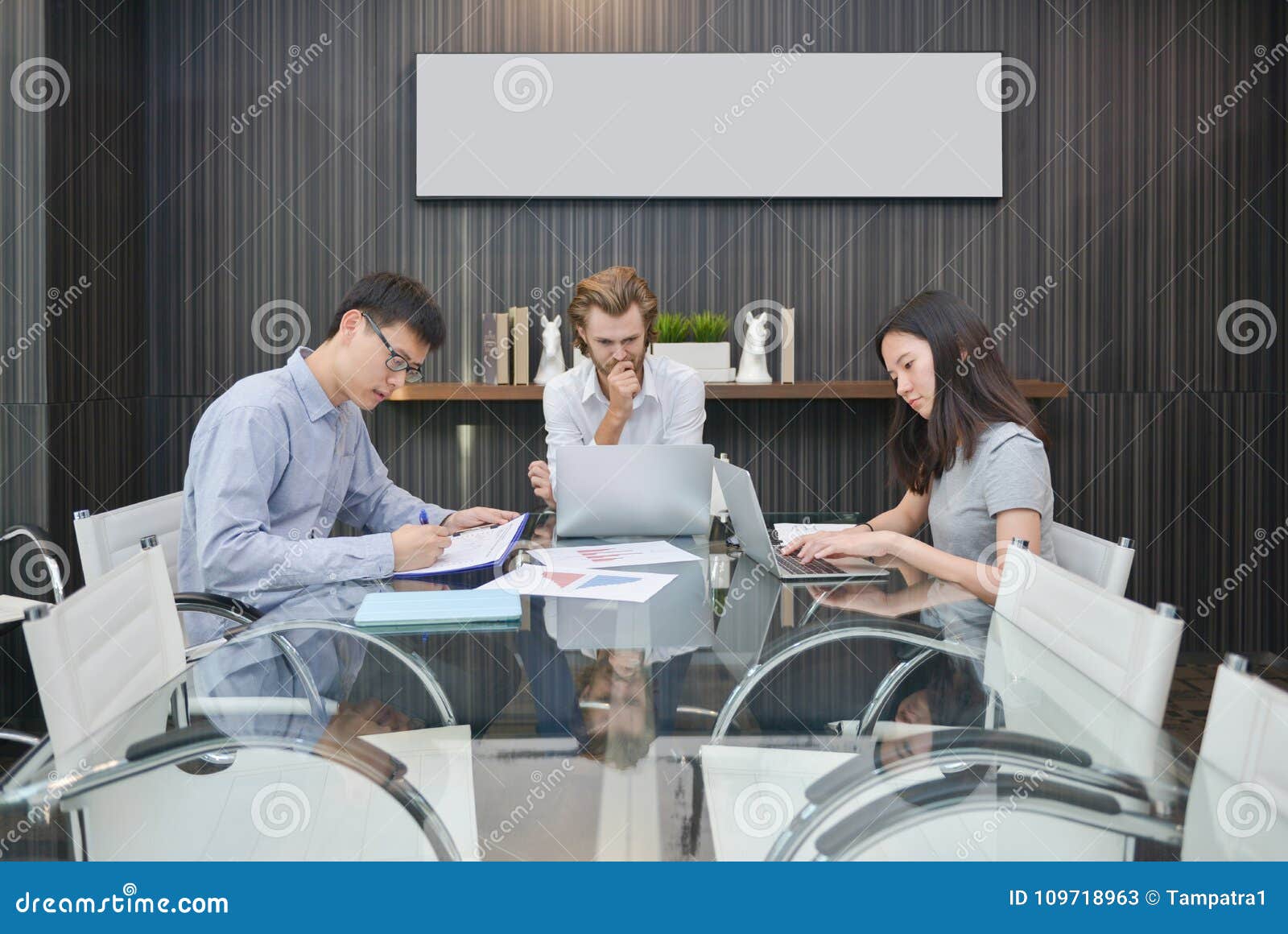 Group of Business People Thinking in a Meeting Room, Sharing the Stock ... Group of Business People Thinking in a Meeting Room, Sharing the Stock ...