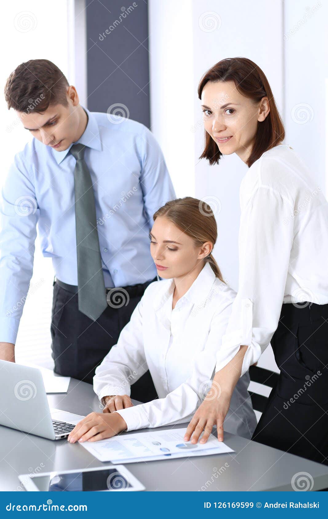 Group of Business People Using Laptop Computer in Office. Meeting and ...