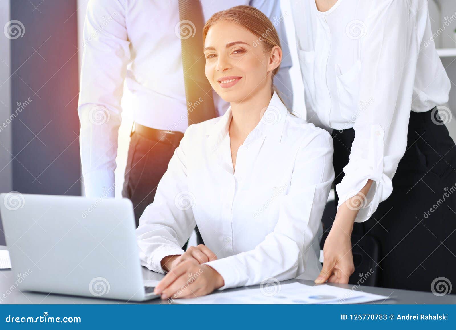 Group of Business People Using Laptop Computer in Office. Meeting and ...