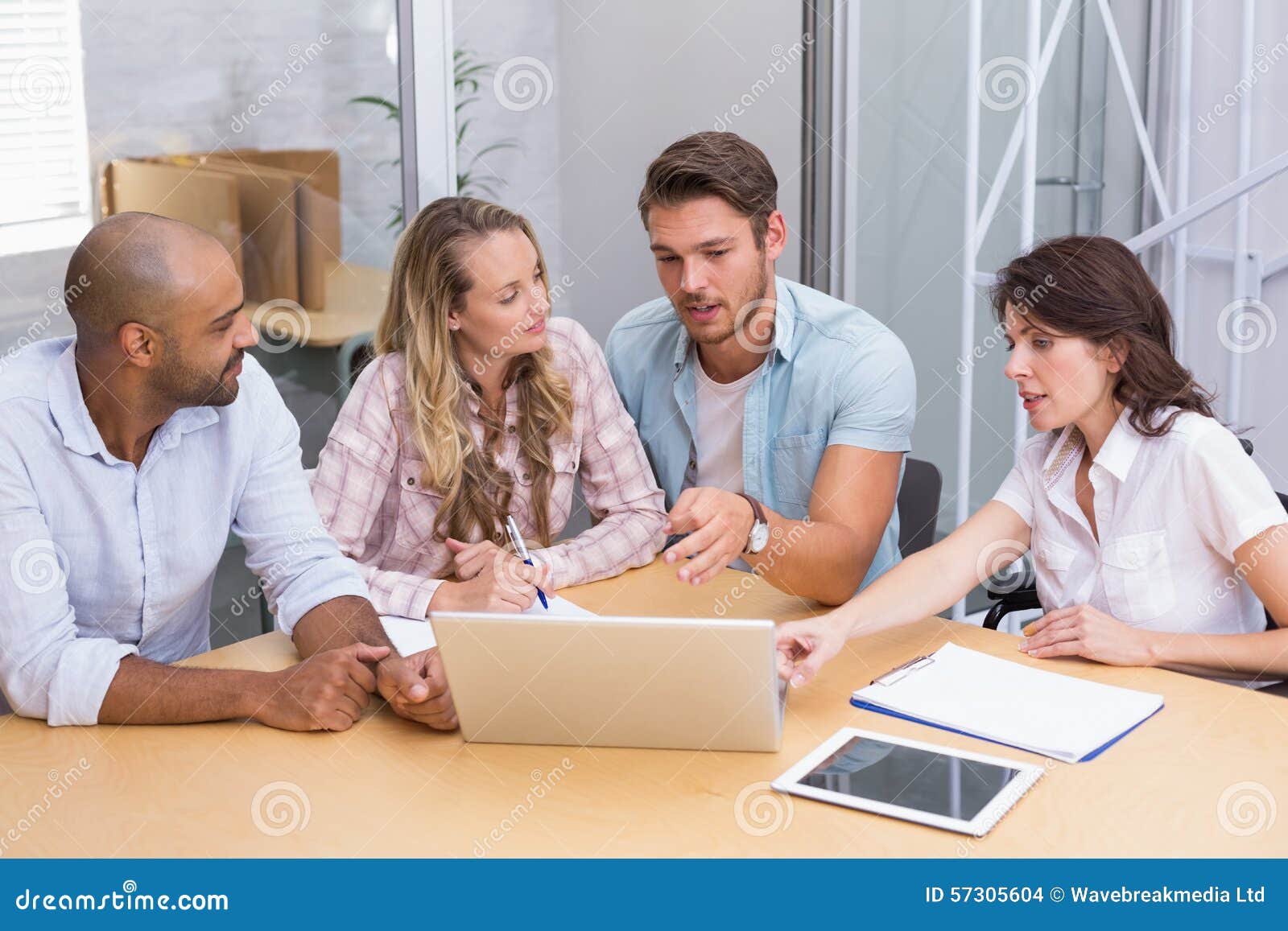 Group of Business People Using Tablet Computer and Laptop Stock Photo ...