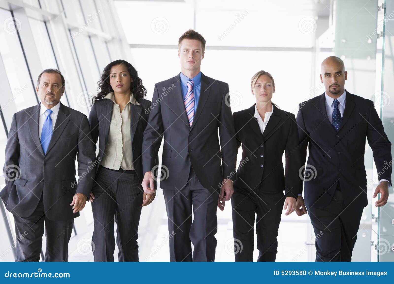 Group of Business People Walking Towards Camera Stock Photo - Image of ...