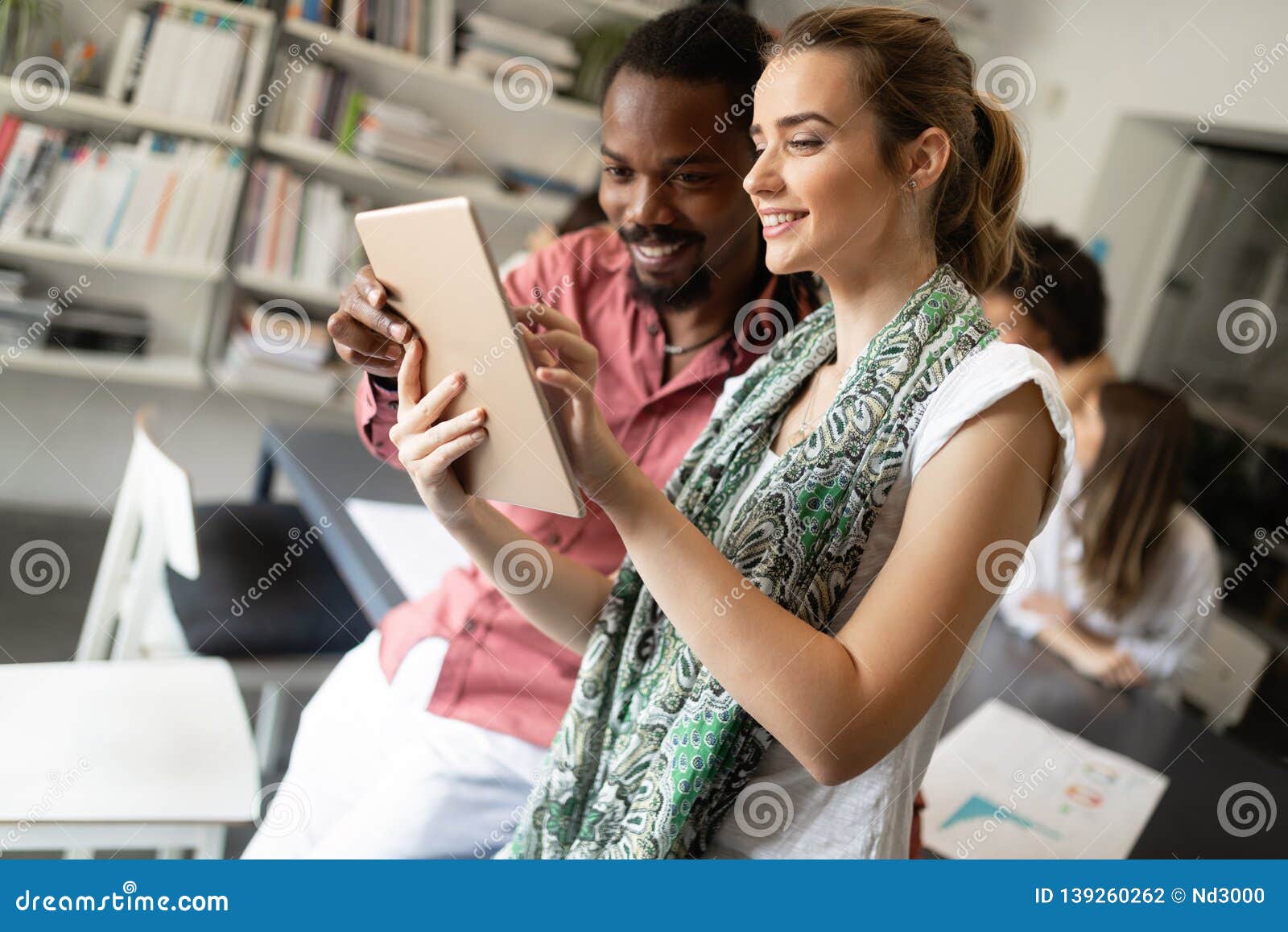 Group of Business People Working and Communicating in Office Together ...