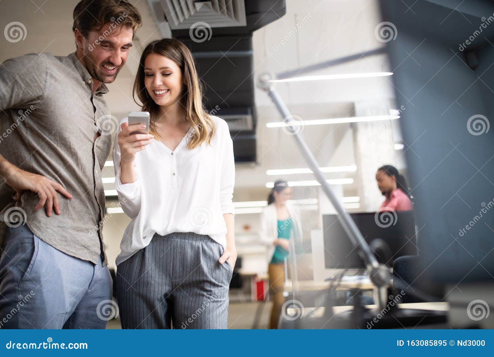 Group of Business People Working and Communicating in Office Together ...
