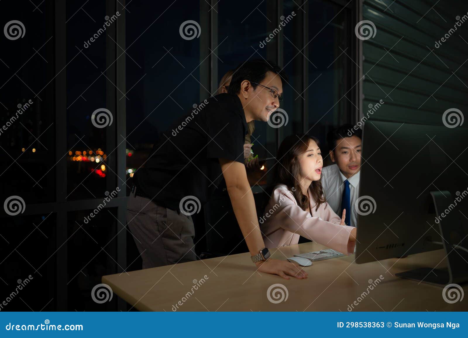 Group of Business People Working in Office at Night. Stock Image ...