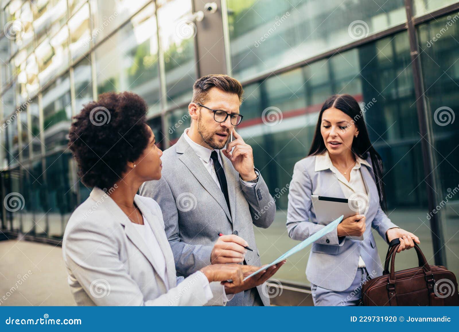 Business Team Meeting Outside. Employed with the Boss Stock Photo ...