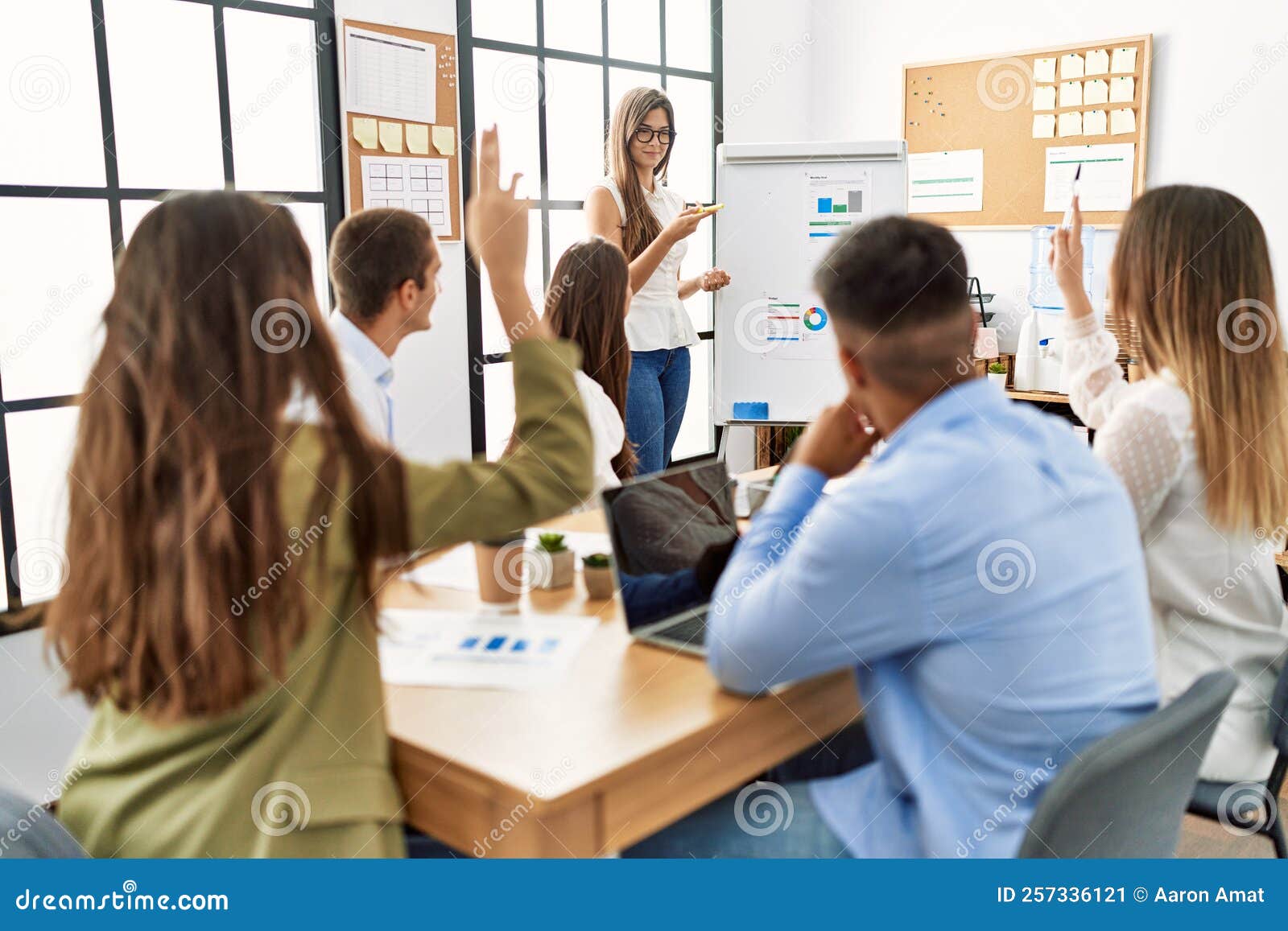 Group of Business Workers on Chart Board Presentation at the Office ...