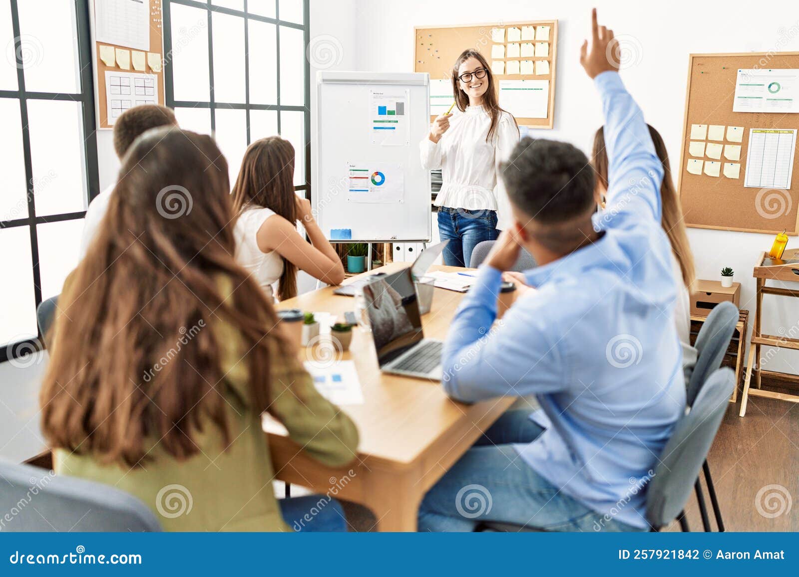 Group of Business Workers on Chart Board Presentation at the Office ...