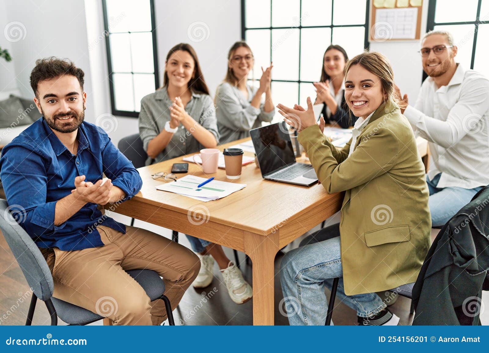 Group of Business Workers Clapping and Looking To the Camera at the ...