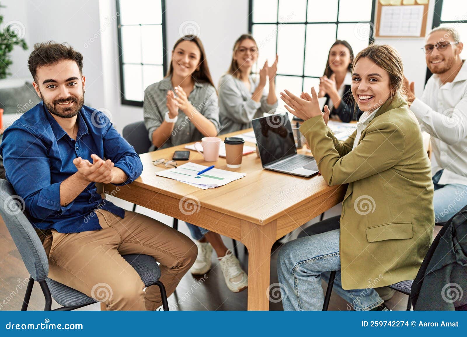 Group of Business Workers Clapping and Looking To the Camera at the ...