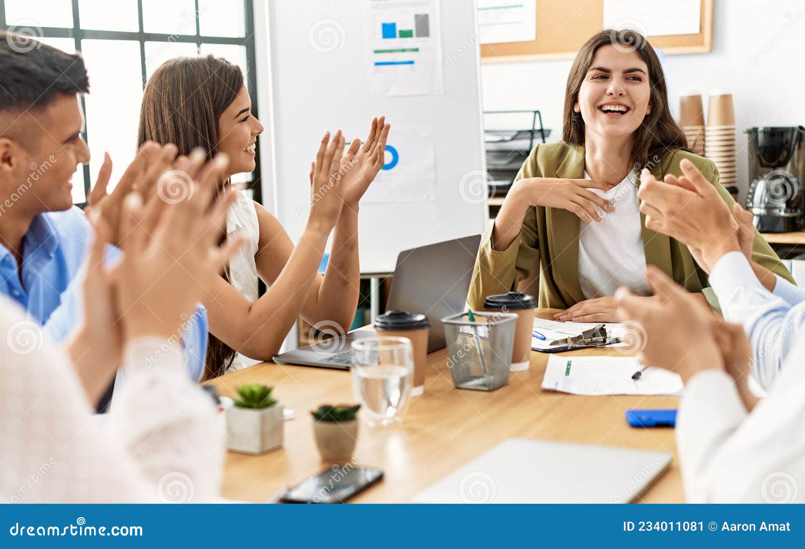 Group of Business Workers Smiling and Clapping To Partner at the Office ...