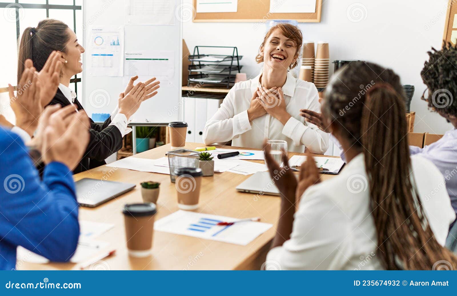 Group of Business Workers Smiling and Clapping To Partner at the Office ...