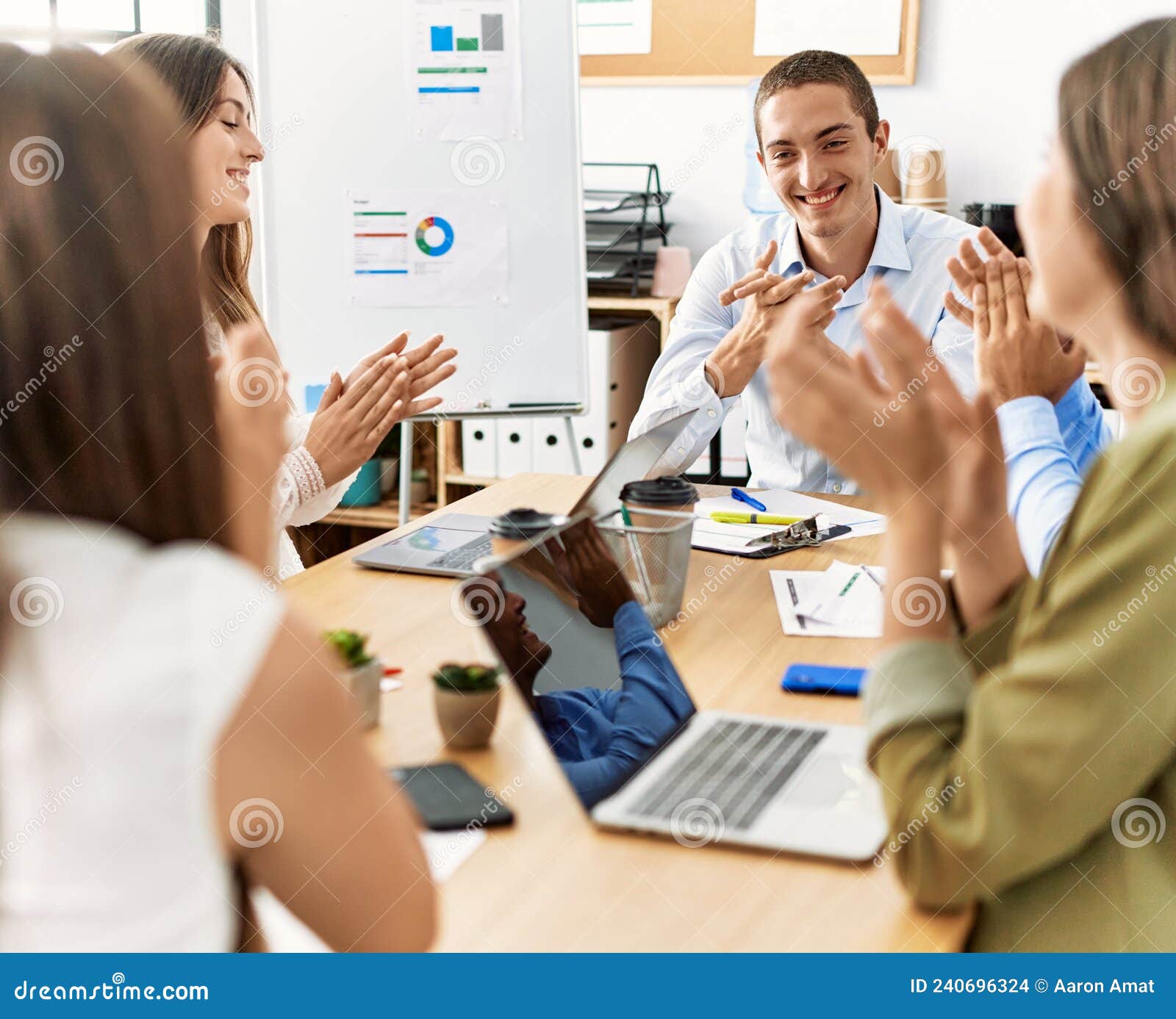 Group of Business Workers Smiling and Clapping To Partner at the Office ...