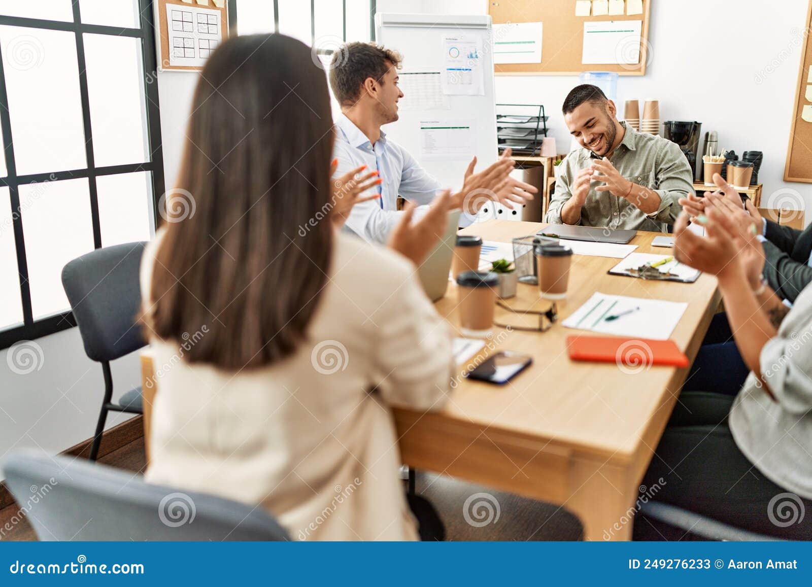 Group of Business Workers Smiling and Clapping To Partner at the Office ...