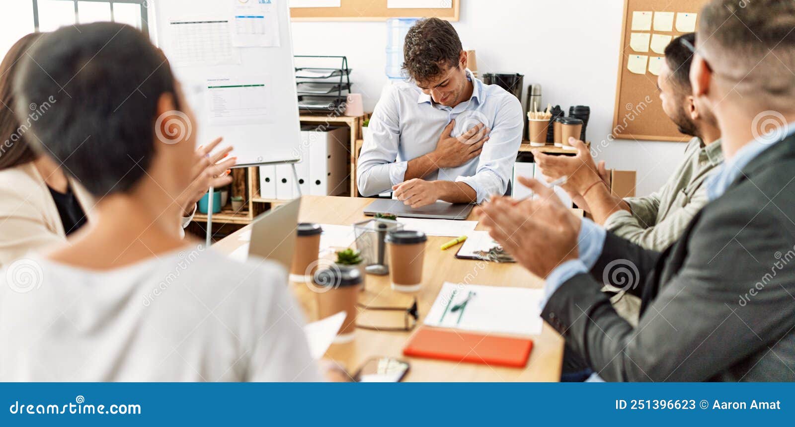 Group of Business Workers Smiling and Clapping To Partner at the Office ...