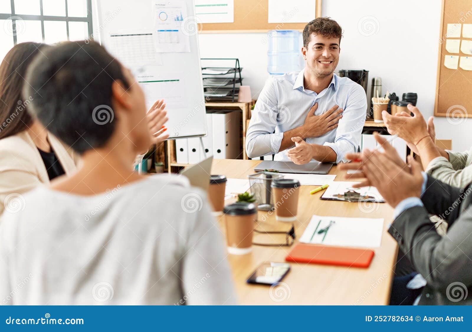 Group of Business Workers Smiling and Clapping To Partner at the Office ...