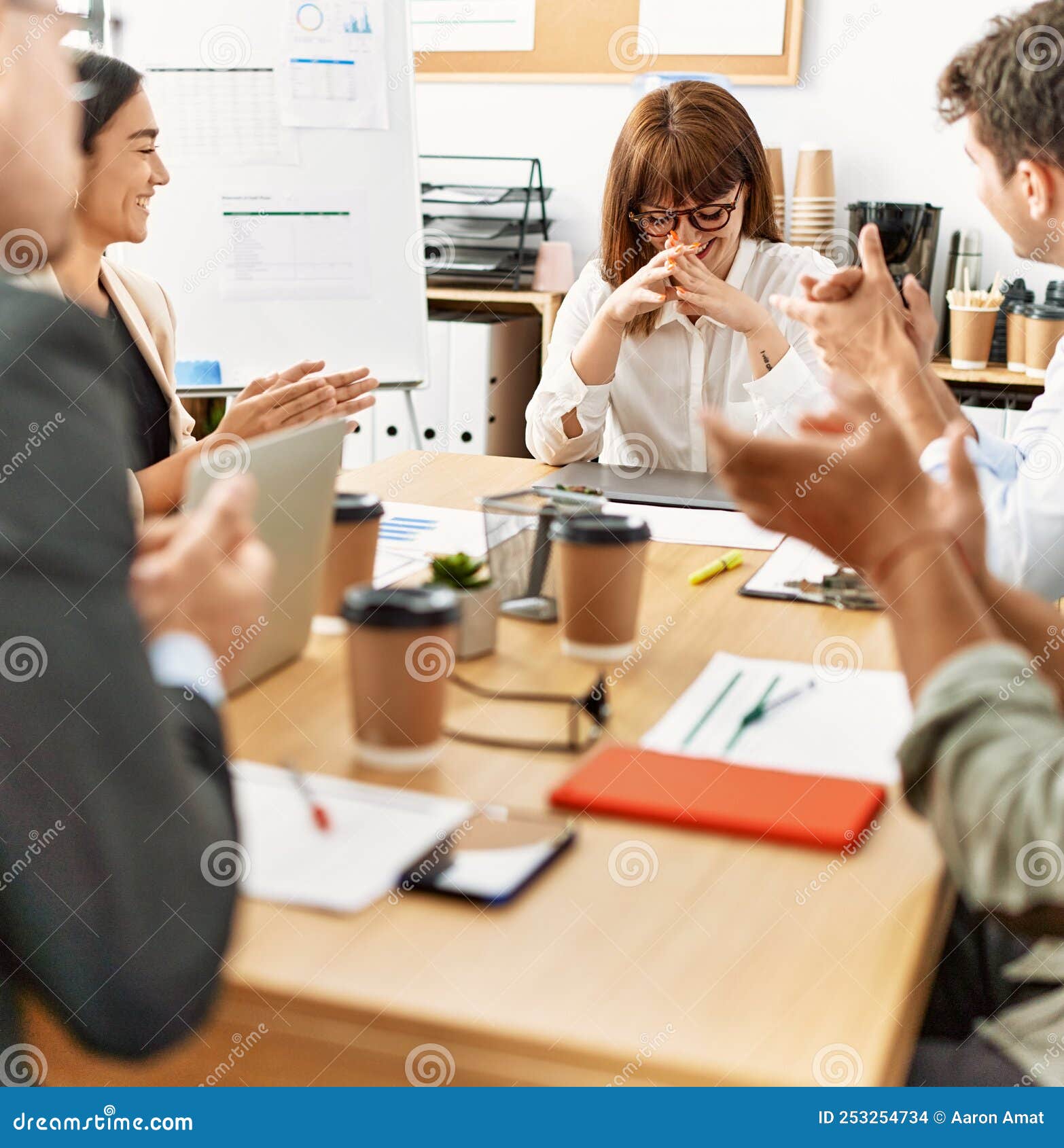 Group of Business Workers Smiling and Clapping To Partner at the Office ...