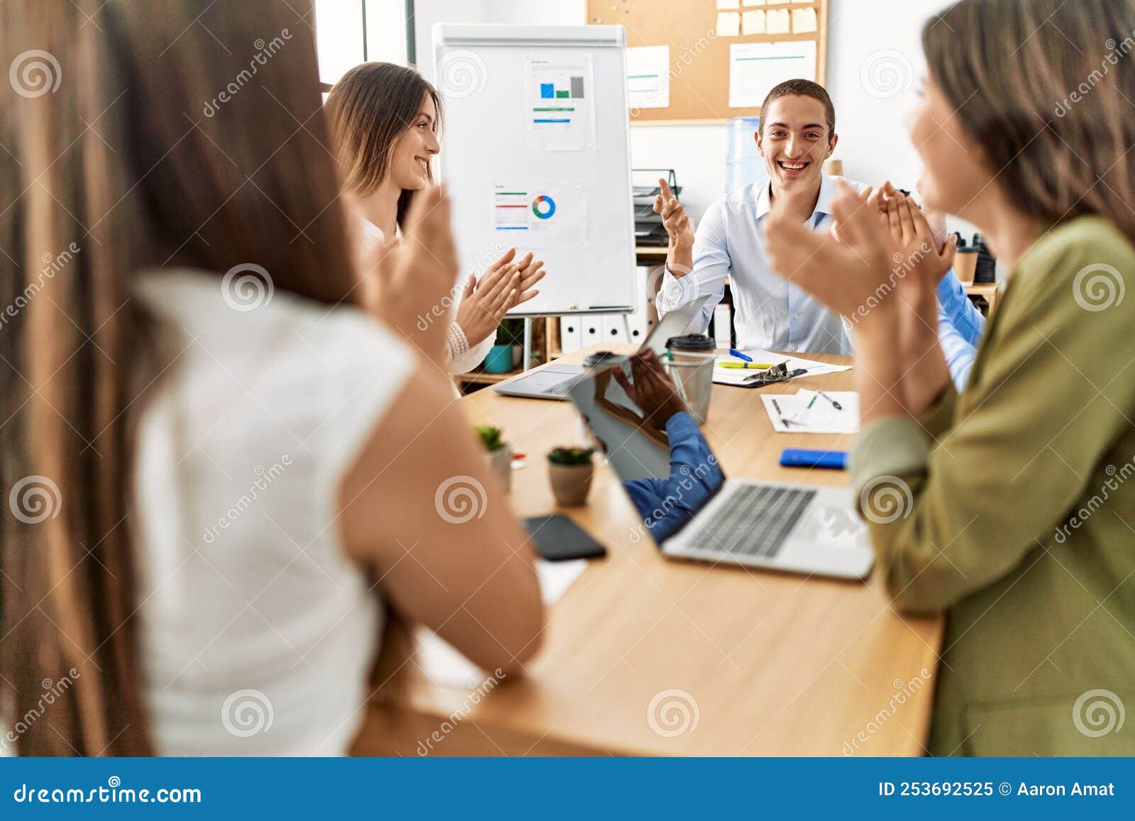 Group of Business Workers Smiling and Clapping To Partner at the Office ...