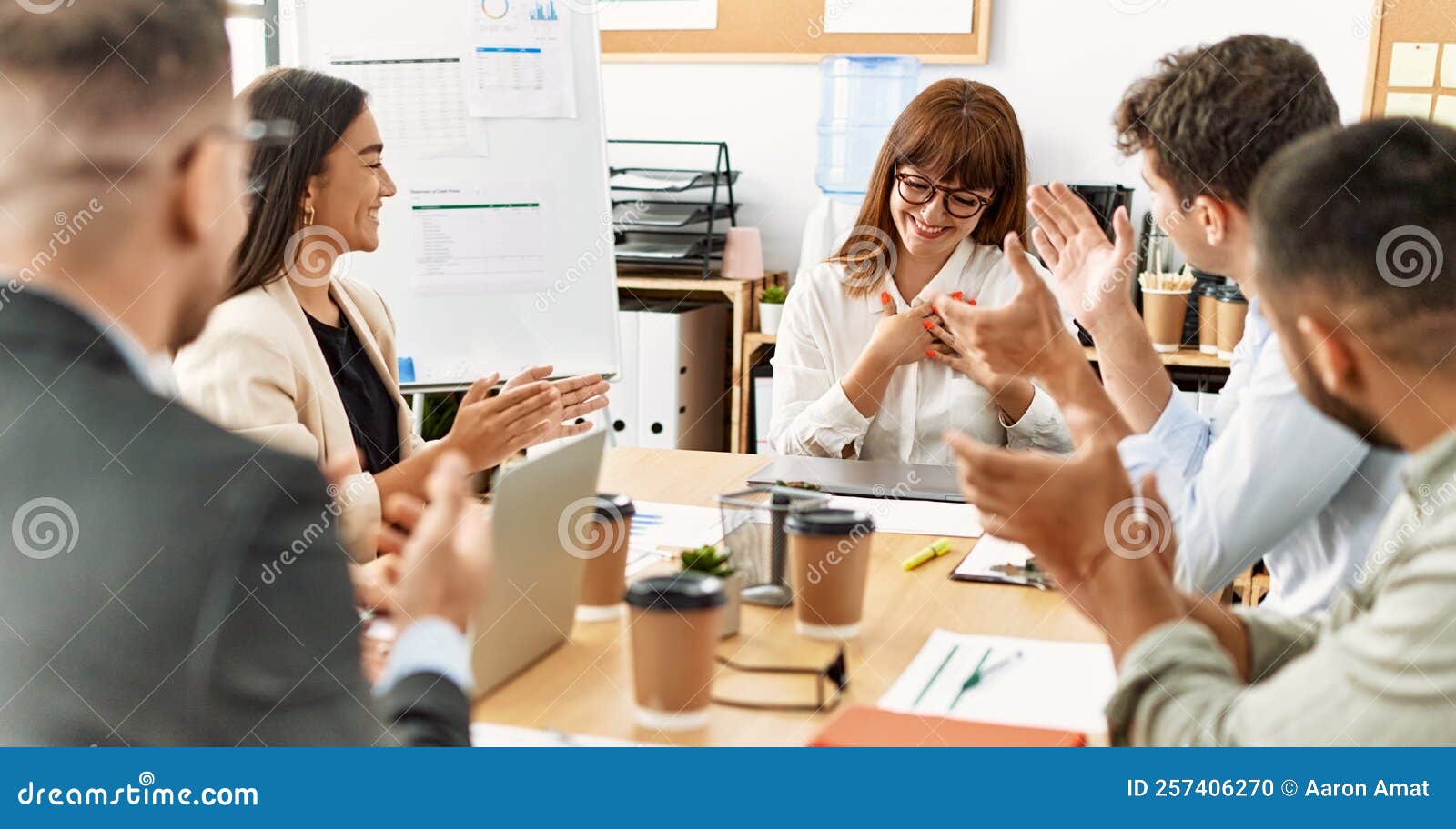 Group of Business Workers Smiling and Clapping To Partner at the Office ...