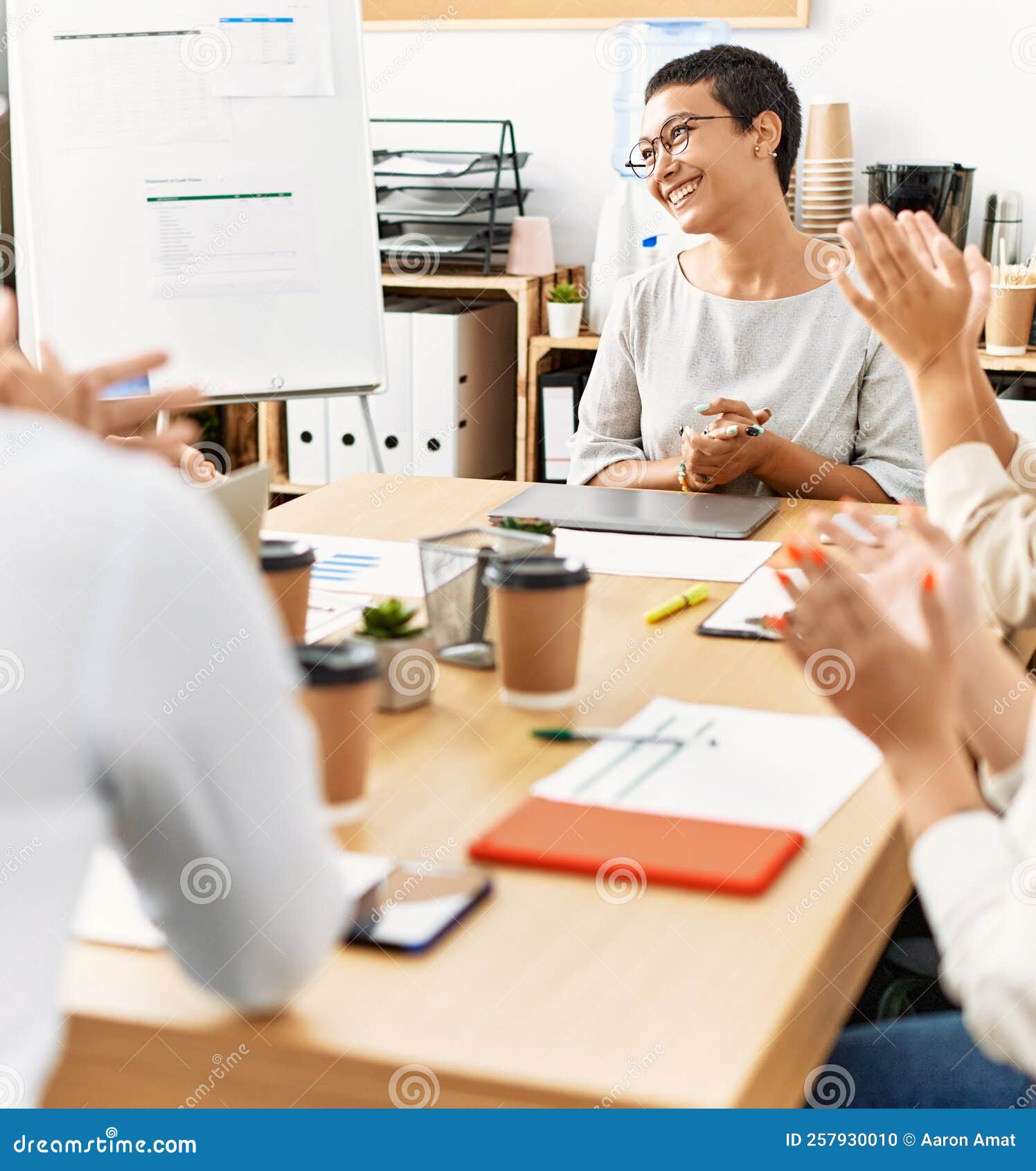 Group of Business Workers Smiling and Clapping To Partner at the Office ...