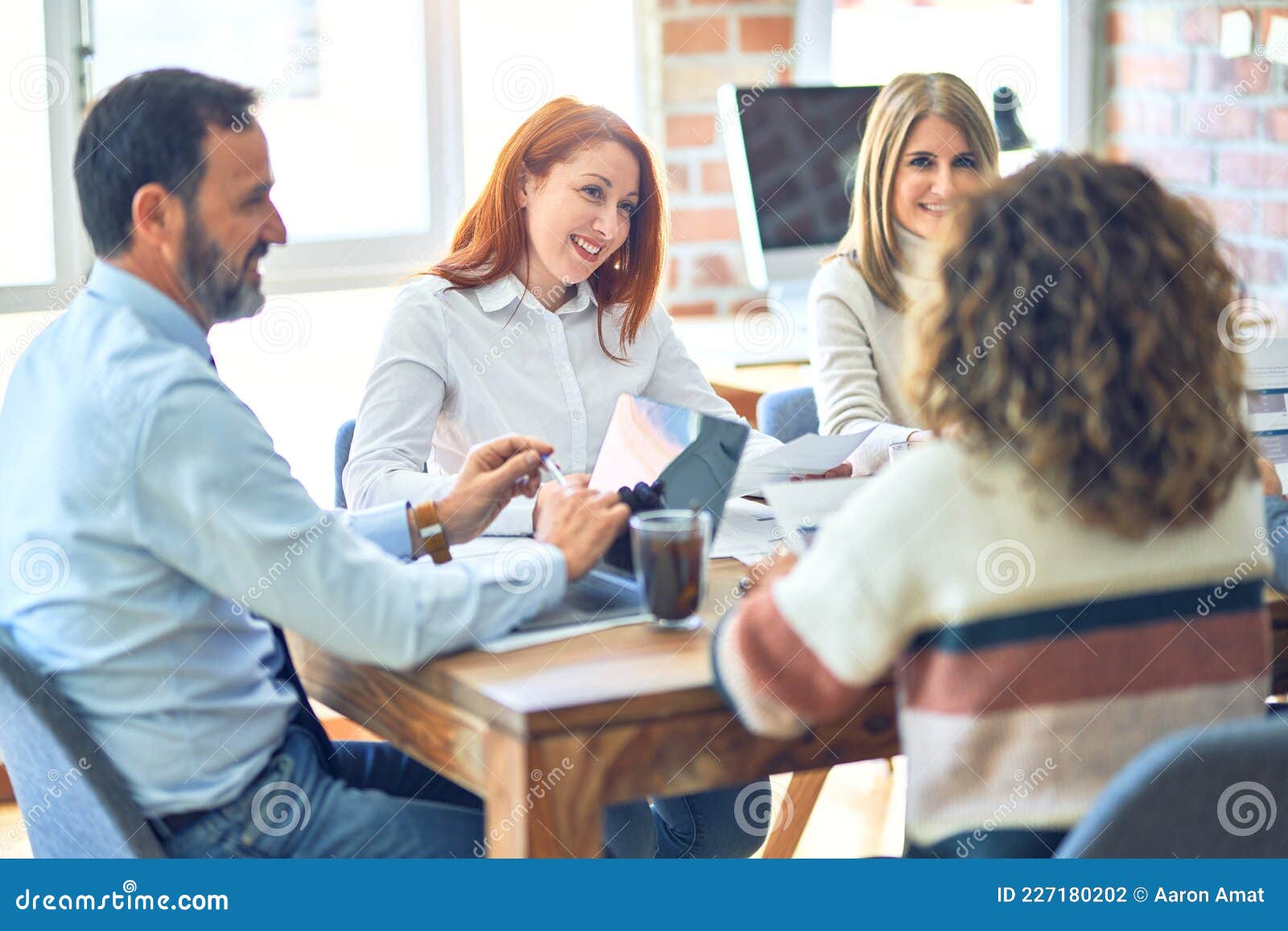 Group of Business Workers Smiling Happy Working Together Stock Photo ...