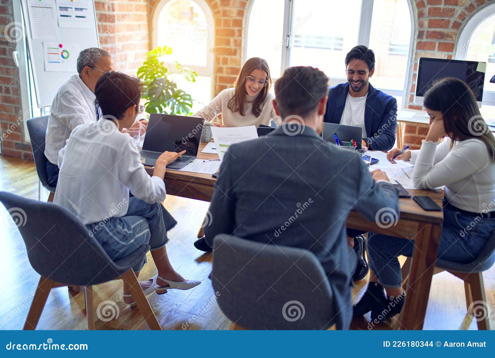 Group of Business Workers Working Together at the Office Stock Photo ...