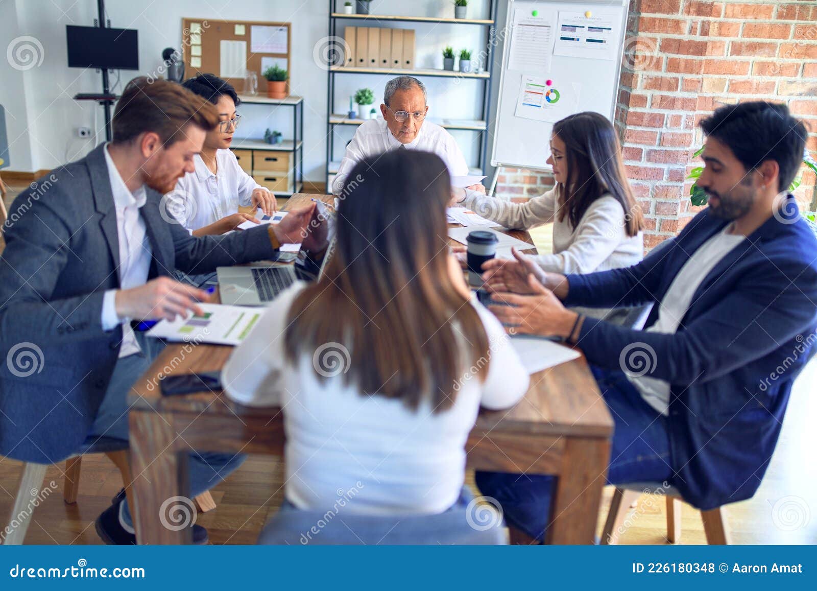 Group of Business Workers Working Together at the Office Stock Photo ...