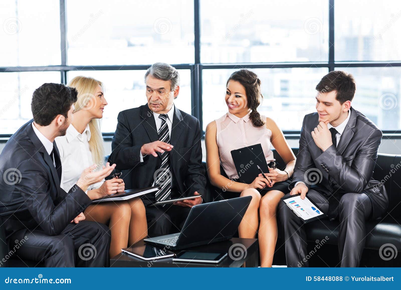 A Group of Businessmen Discussing Stock Photo - Image of caucasian ... A Group of Businessmen Discussing Stock Photo - Image of caucasian ...