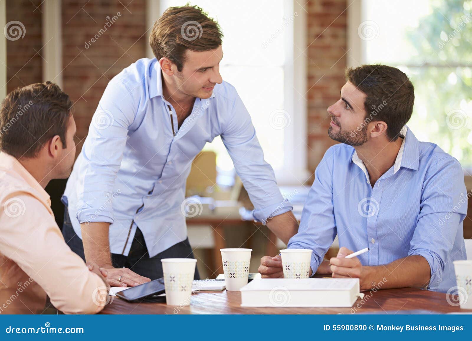 Group of Businessmen Meeting To Discuss Ideas Stock Photo - Image of ...
