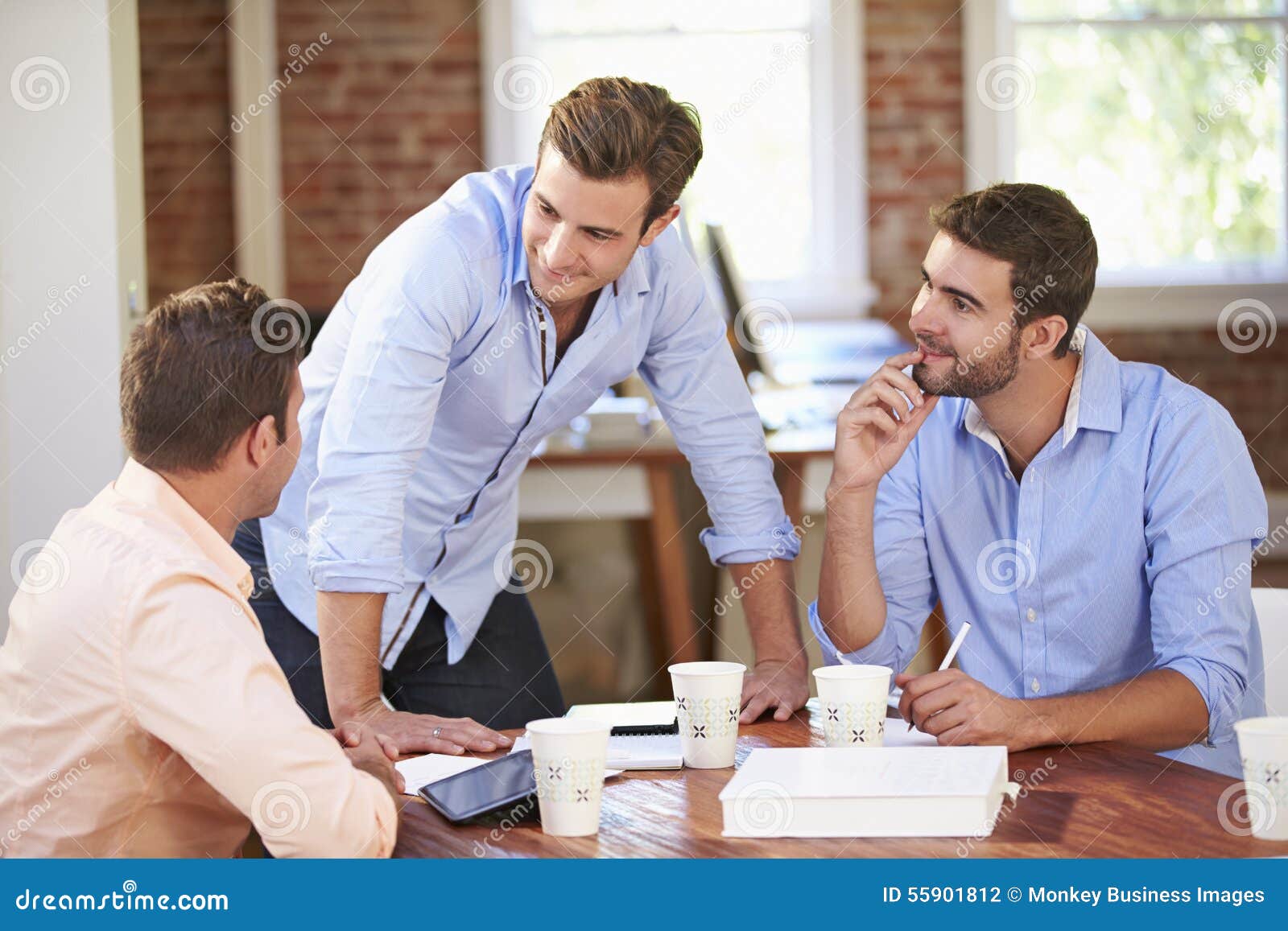 Group of Businessmen Meeting To Discuss Ideas Stock Photo - Image of ...