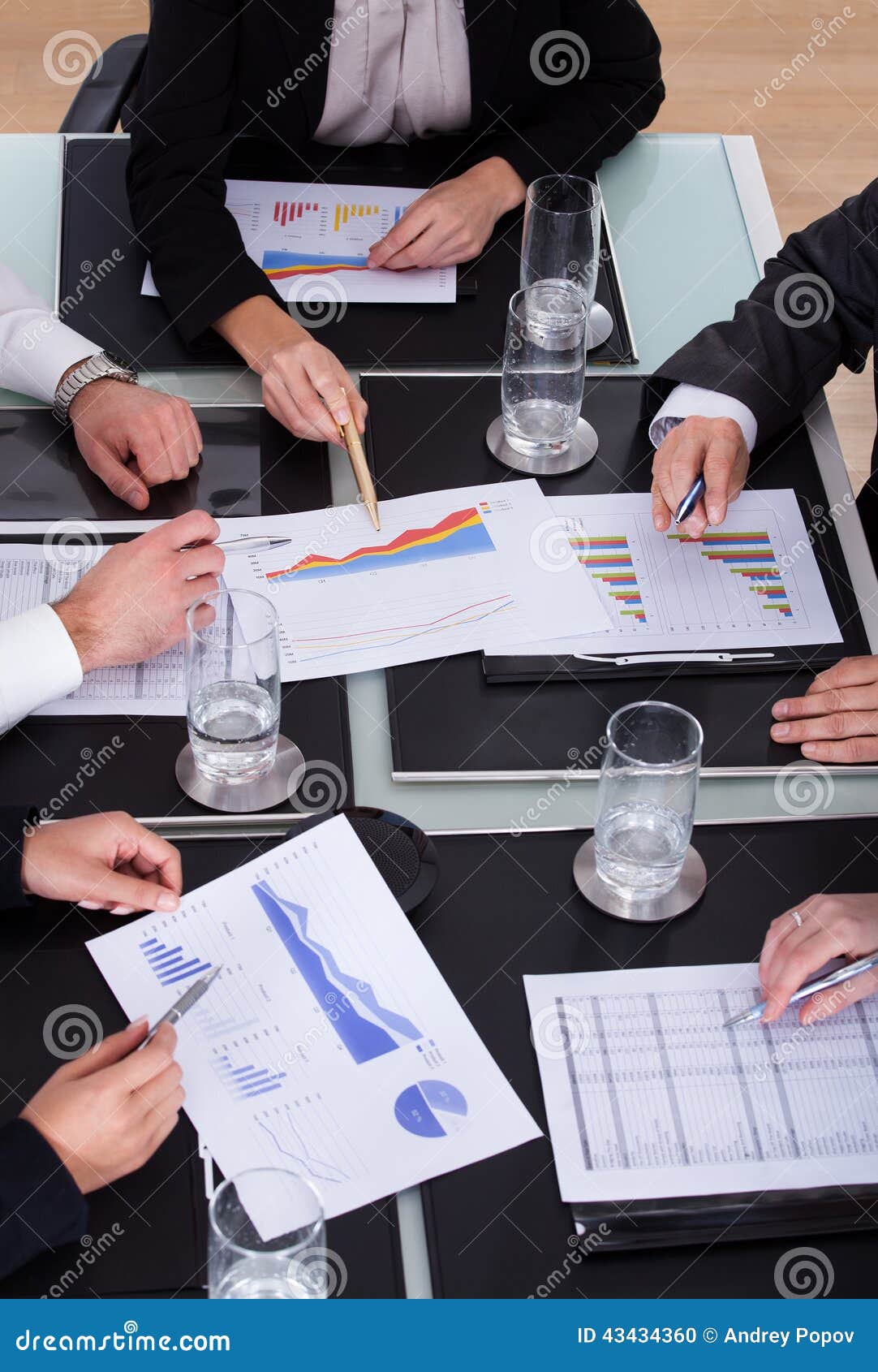 Group of Businesspeople Discussing Plan in Office Stock Photo - Image ...