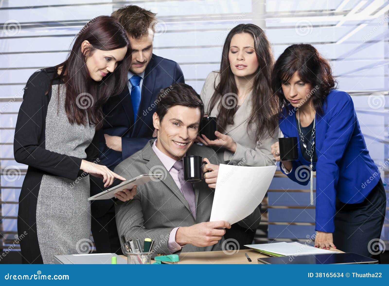 Group of Businesspeople with Happy Leader in Office Stock Photo - Image ...